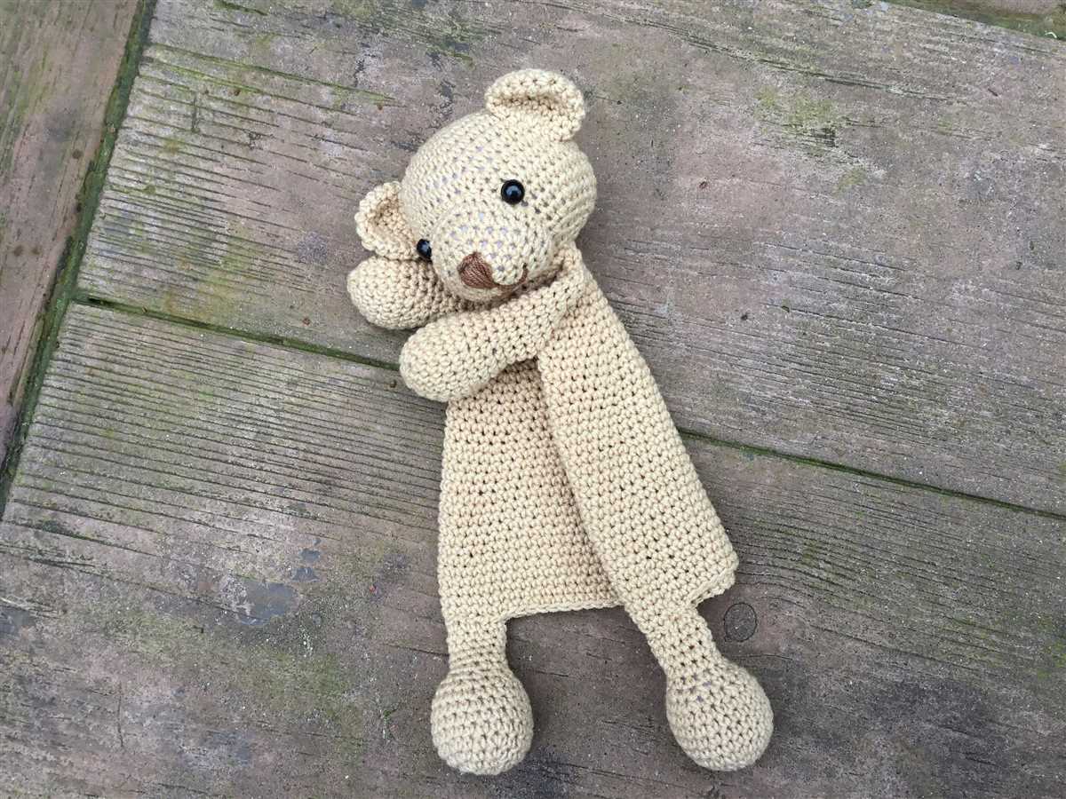 Knit a cute and cuddly flat teddy bear with this easy pattern