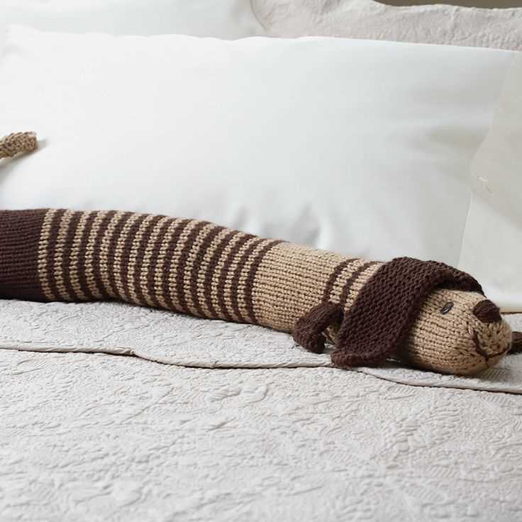 Cozy up your home with this DIY draught excluder knitting pattern