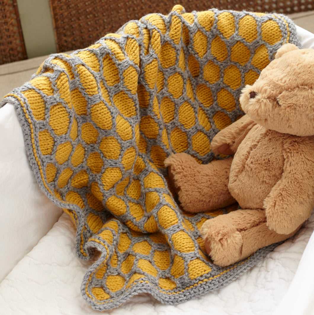 Free pattern for knitting a fidget blanket
