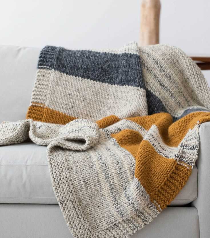 Cozy up with a DIY blanket sweater knitting pattern