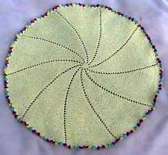 Whirling Pinwheels: A Charming Blanket Knitting Pattern
